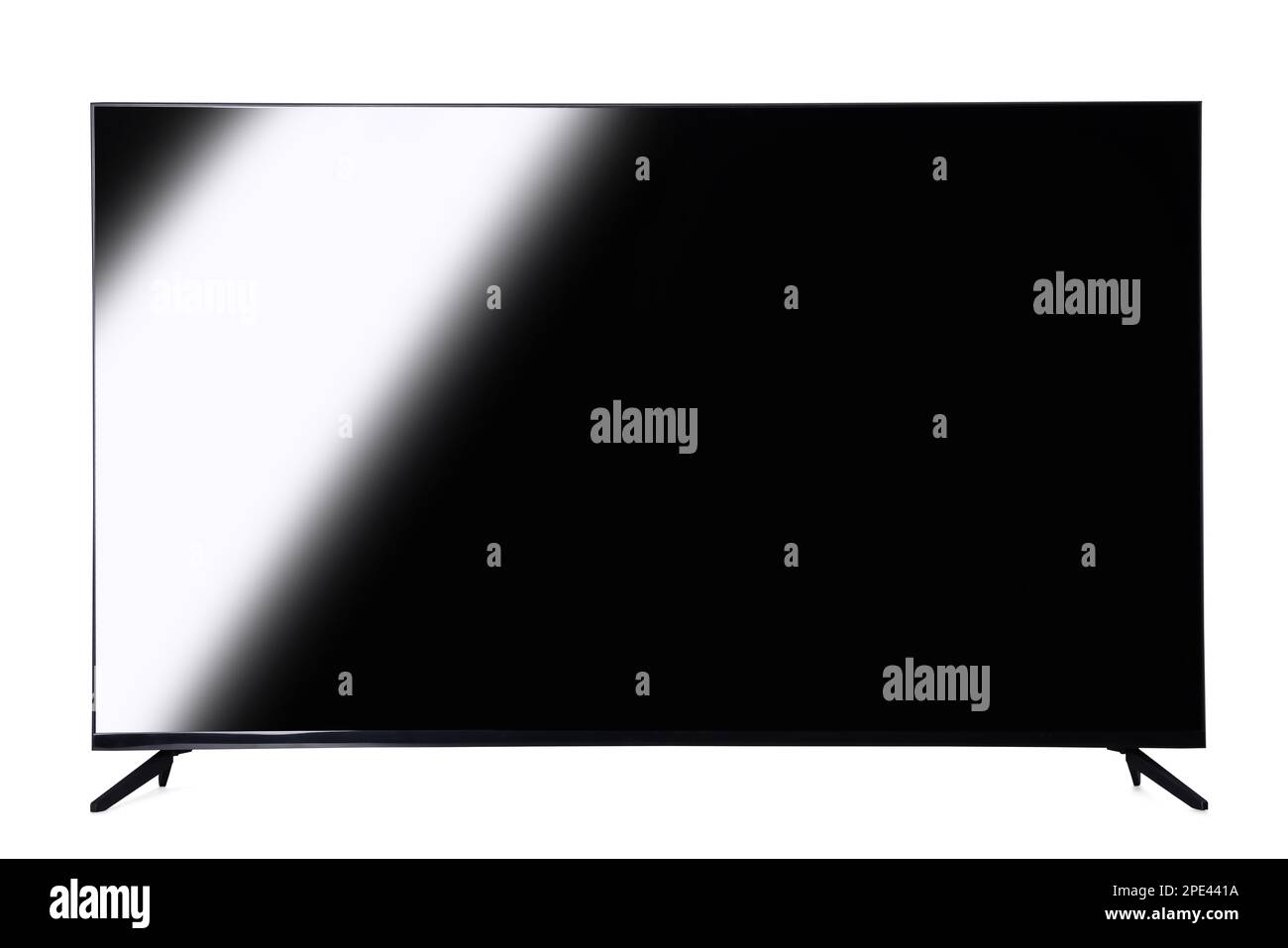 Modern TV on table against grey background Stock Photo - Alamy