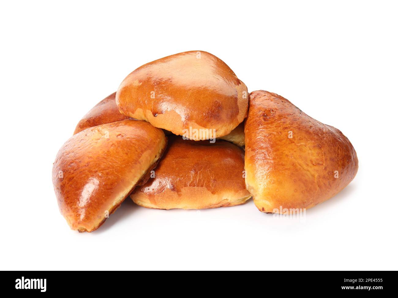 Baked pirozhki on white background. Delicious pastry Stock Photo - Alamy