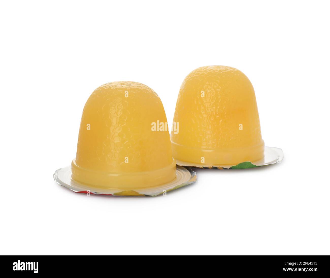 Delicious yellow jelly cups on white background Stock Photo - Alamy