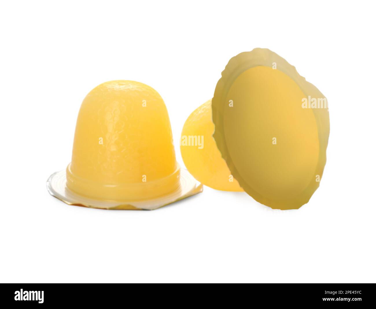 Delicious yellow jelly cups on white background Stock Photo - Alamy