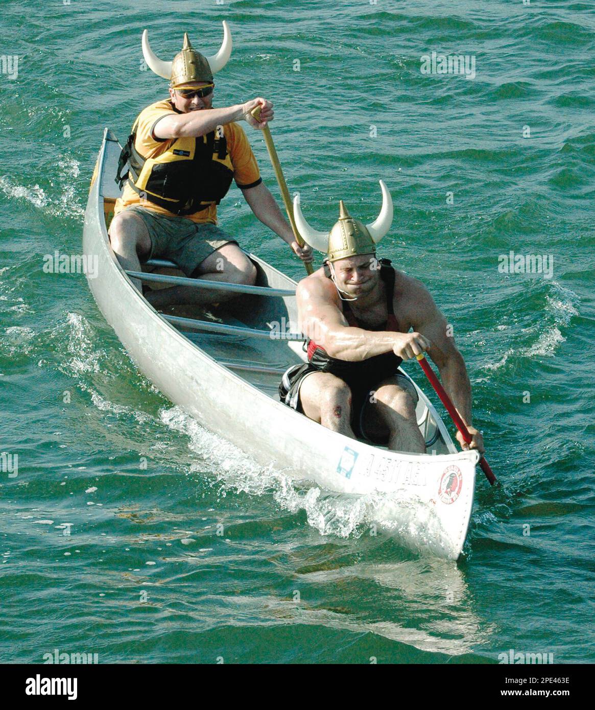 Gabe, front, and Sam Hathaway of Ames, Iowa, strain as they paddle in ...
