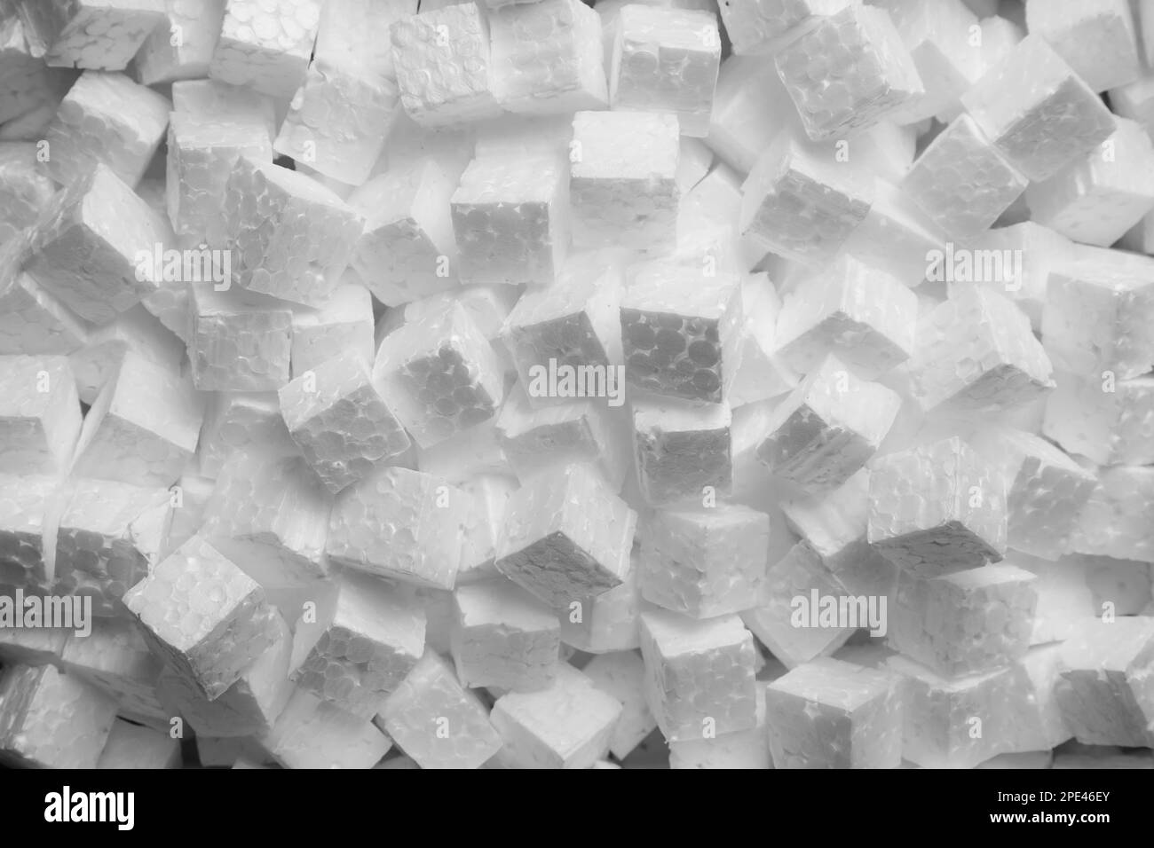 Polystyrene styrofoam pieces for packaging as background, top view ...