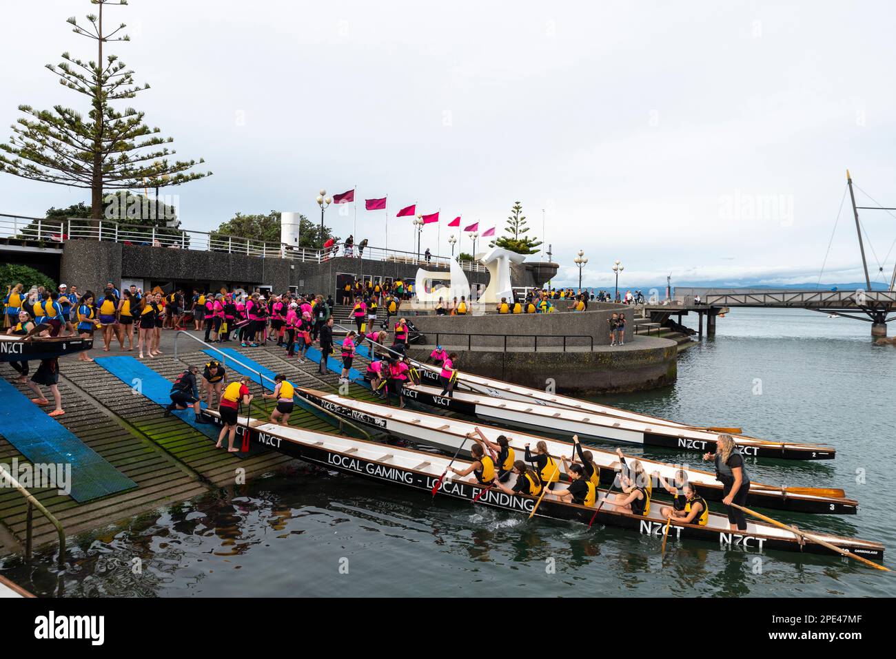 Dragon boat teams training in Whairepo Lagoon for a forthcoming ...