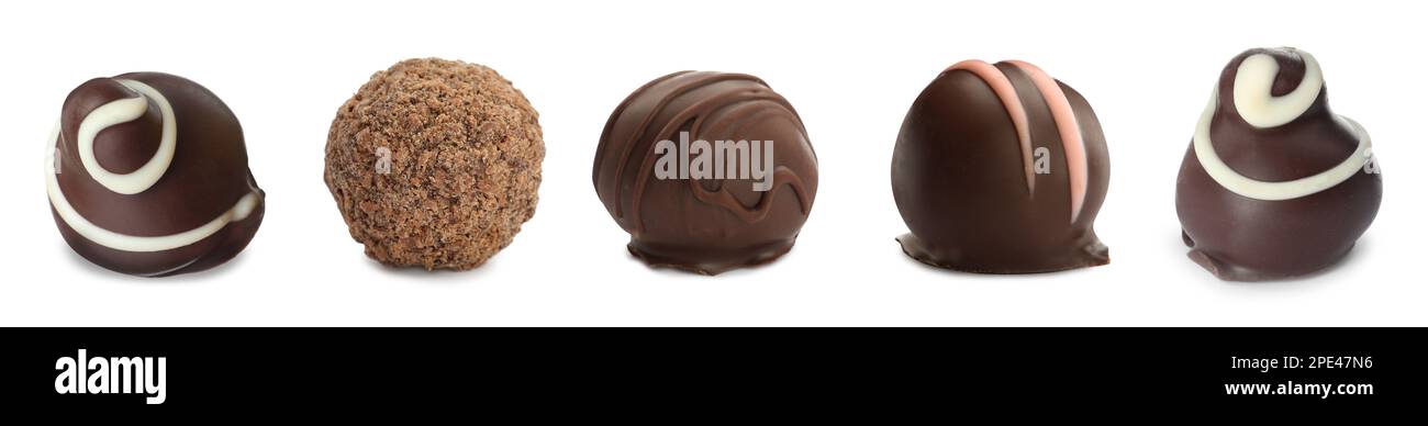 Set with delicious sweet chocolate truffles on white background. Banner ...
