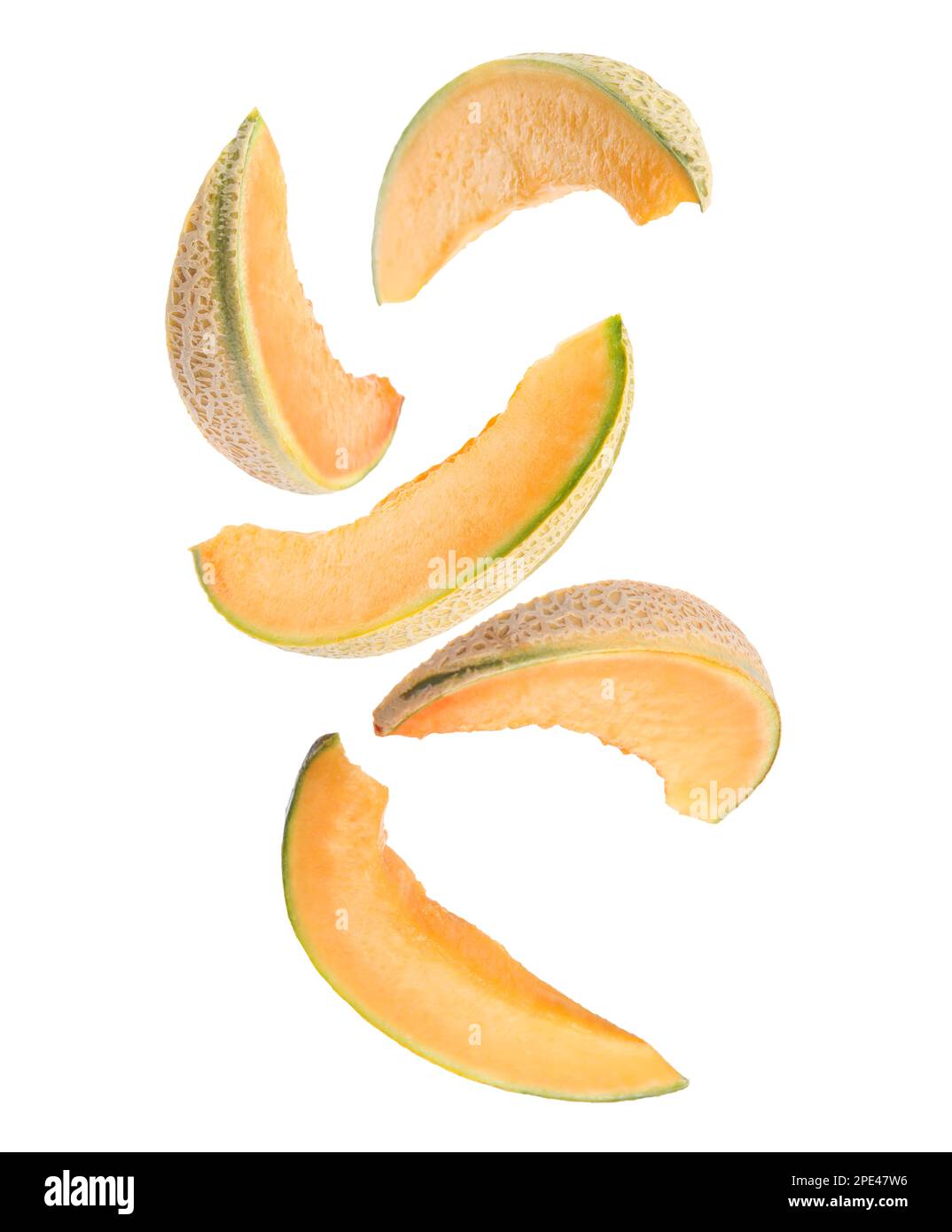 Pieces of delicious ripe melon falling on white background Stock Photo ...