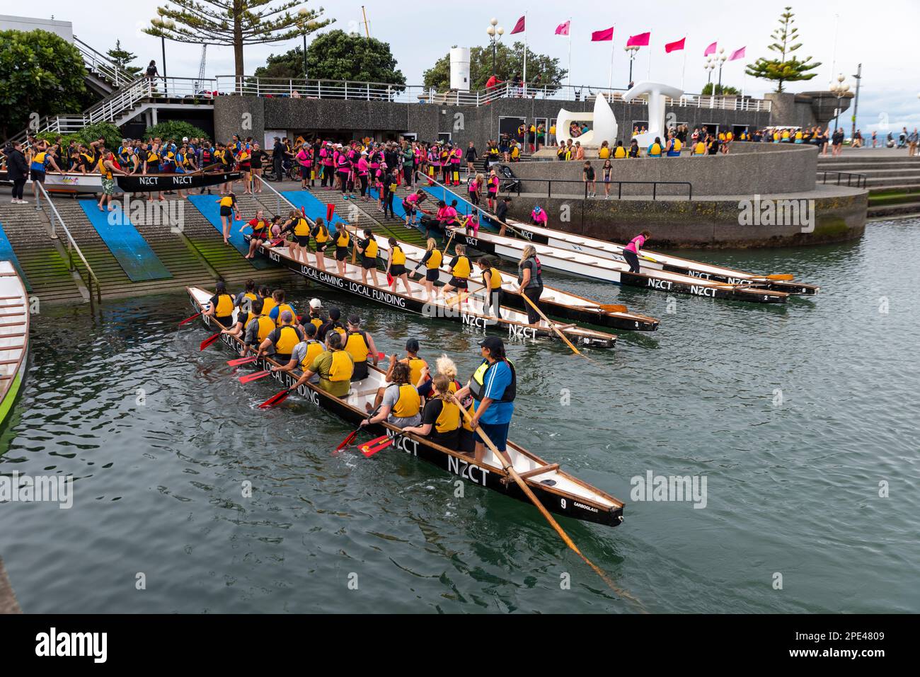 Dragon boat teams training in Whairepo Lagoon for a forthcoming ...