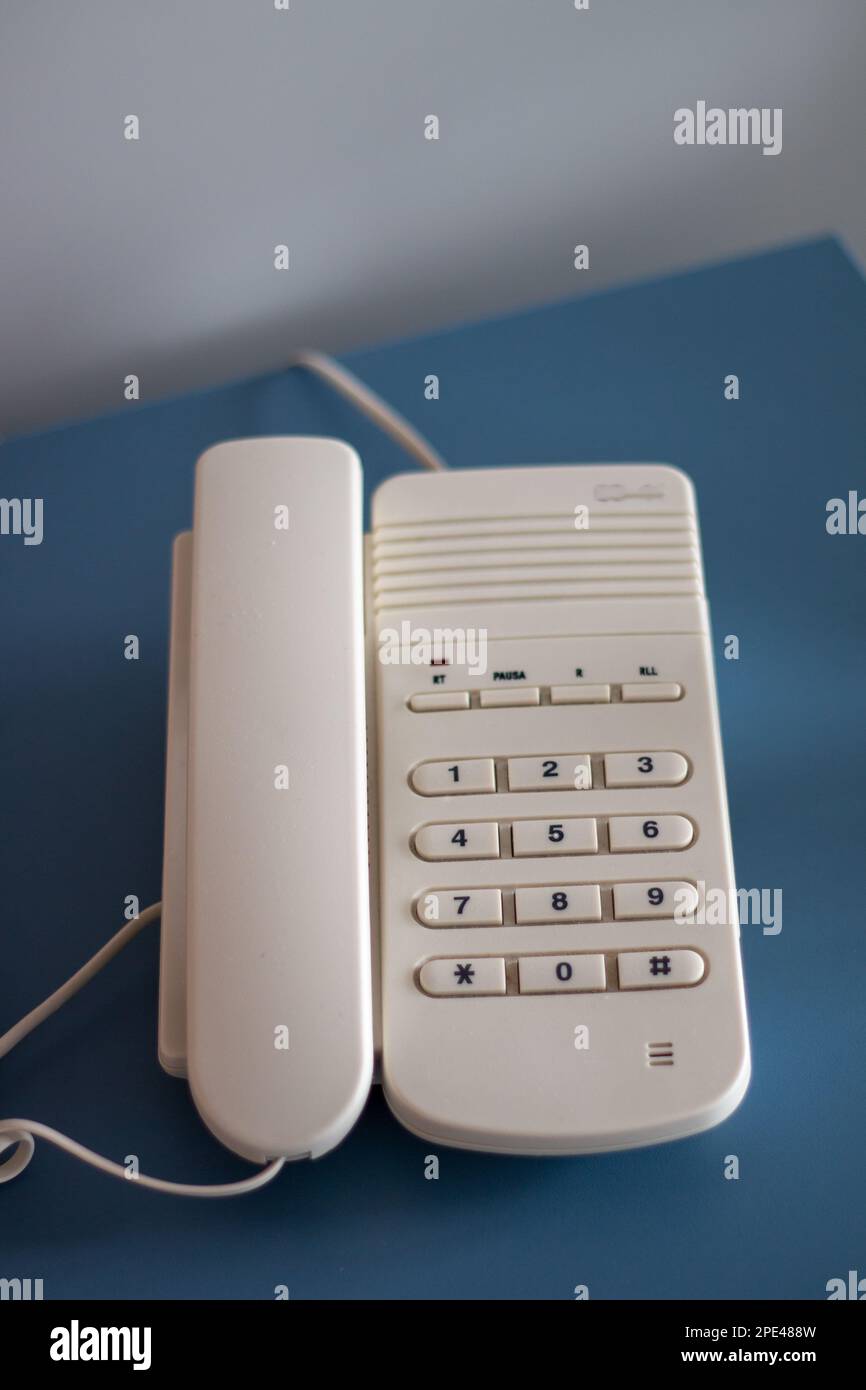 analogue desktop telephone with keys and cable Stock Photo - Alamy