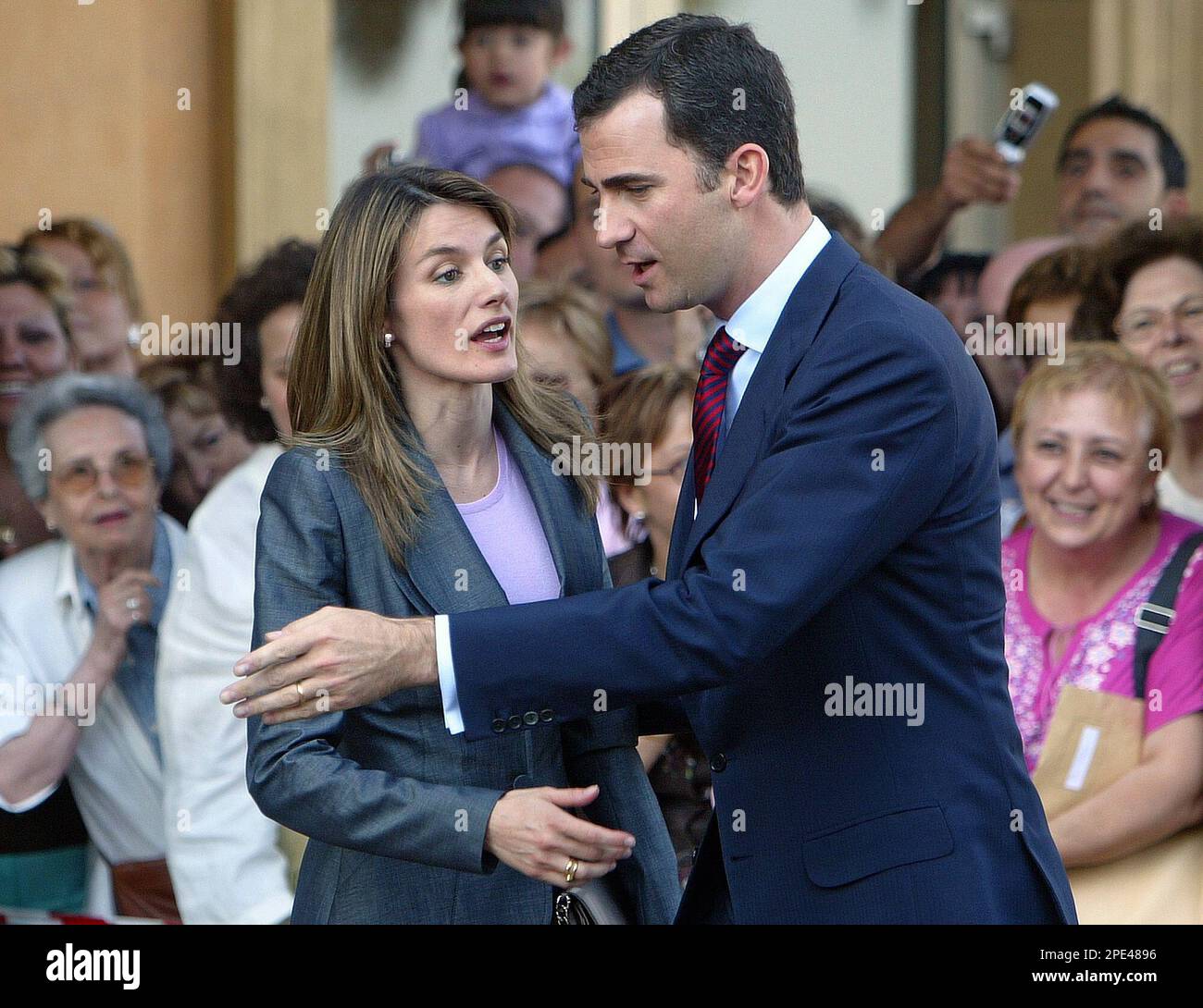 Spanish Crown Prince Felipe, right, and his wife Princess Letizia are ...