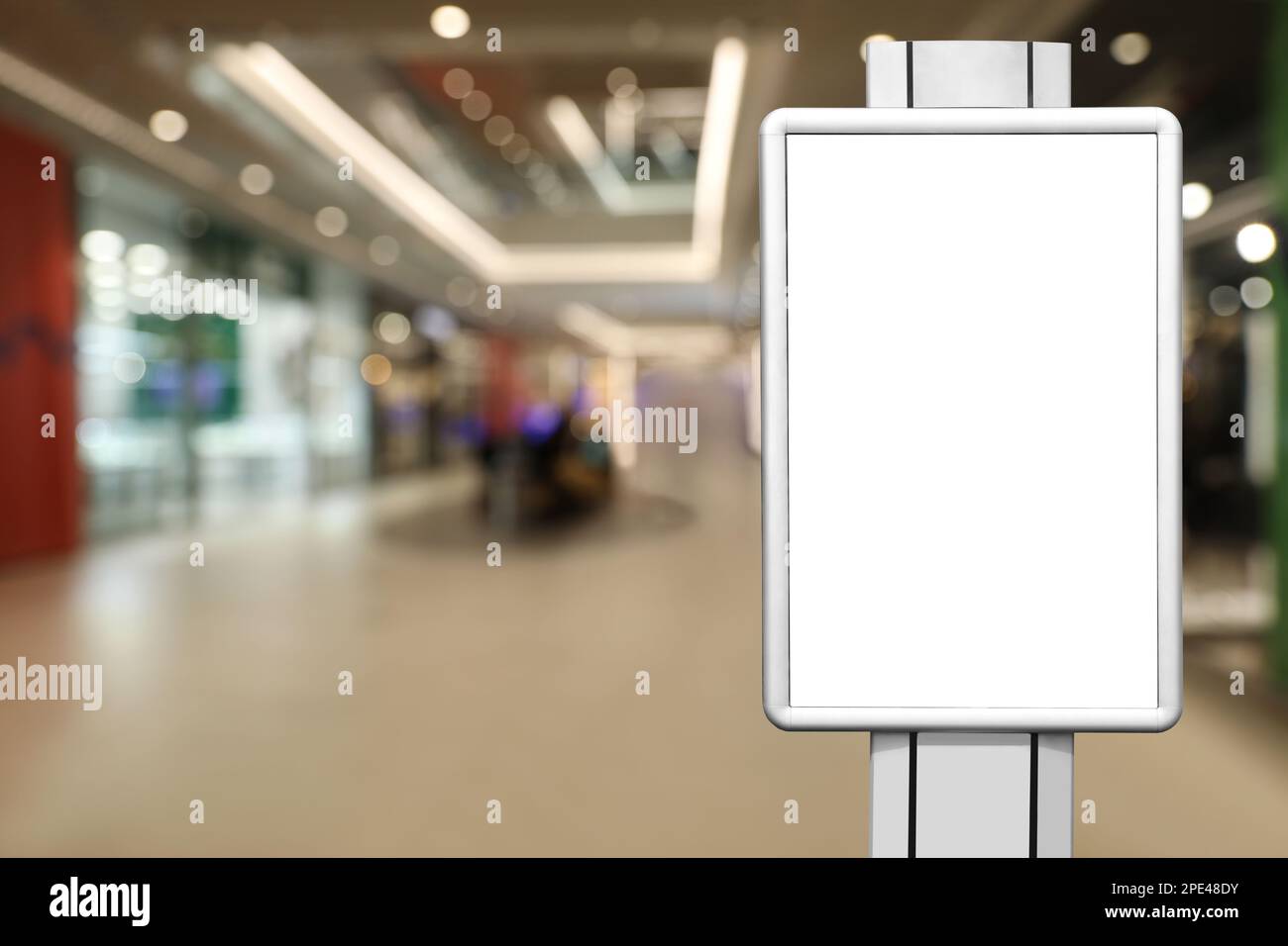 Blank advertising board in shopping mall. Space for text Stock Photo ...
