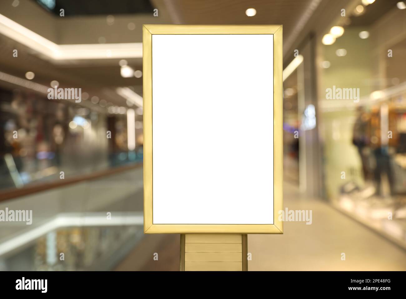 Blank advertising board in shopping mall. Space for text Stock Photo ...