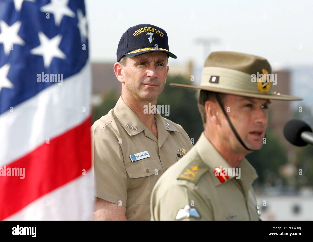 Vice Admiral Jon Greenert, Commander, US Seventh Fleet left, watches as ...