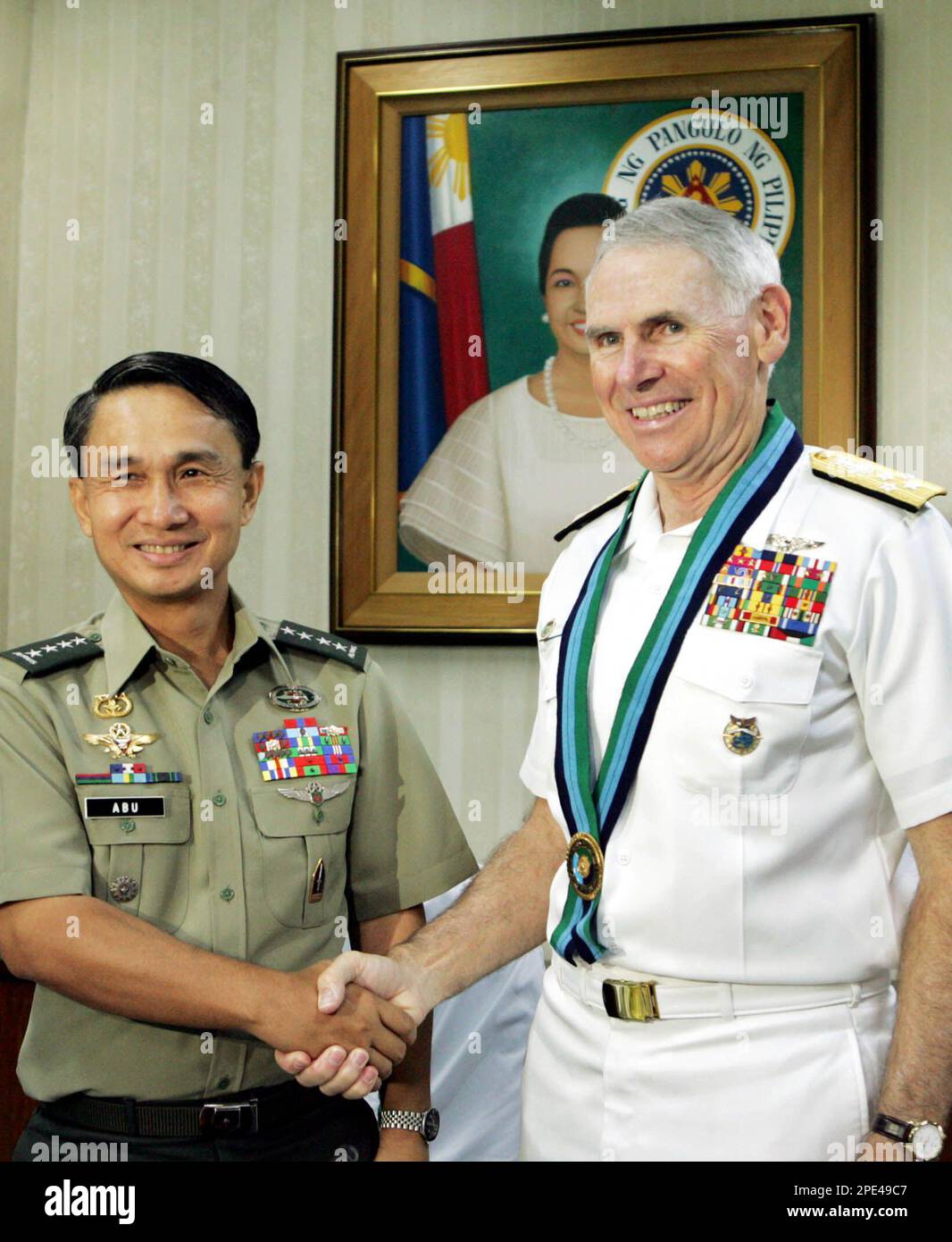 Armed Forces of the Philippines Chief of Staff General Efren Abu, left ...