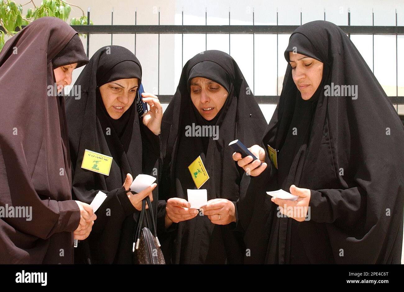 Lebanese women, supporters of the Hezbollah Shiite Muslim group, make ...