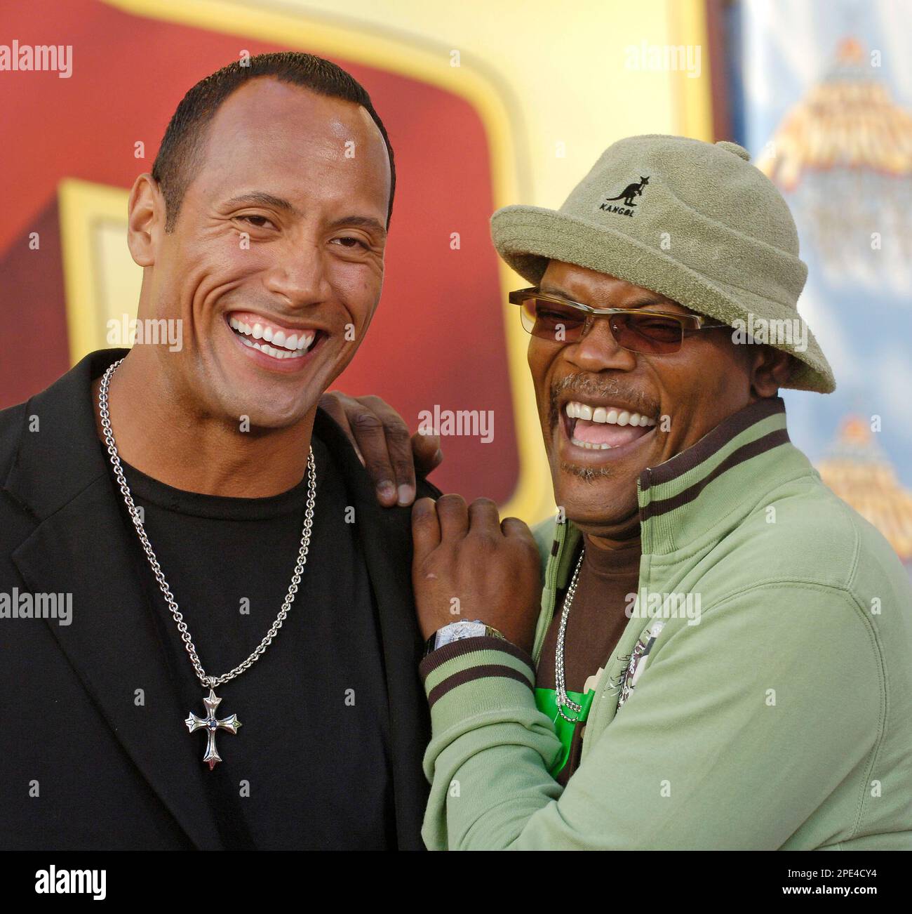 Dwayne Johnson, "The Rock," arrives with Samuel L. Jackson, right, for ...
