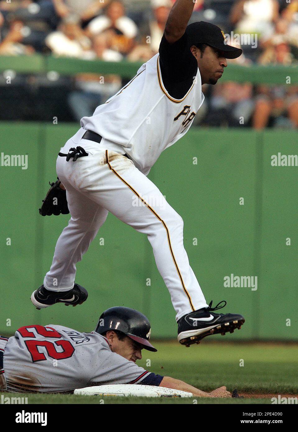 Pittsburgh Pirates second baseman Jose Castillo leaps over Atlanta ...
