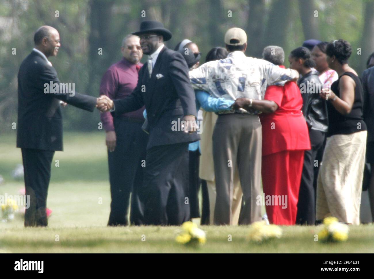 Simeon Wright, left, cousin to Emmett Till, greets family members and ...