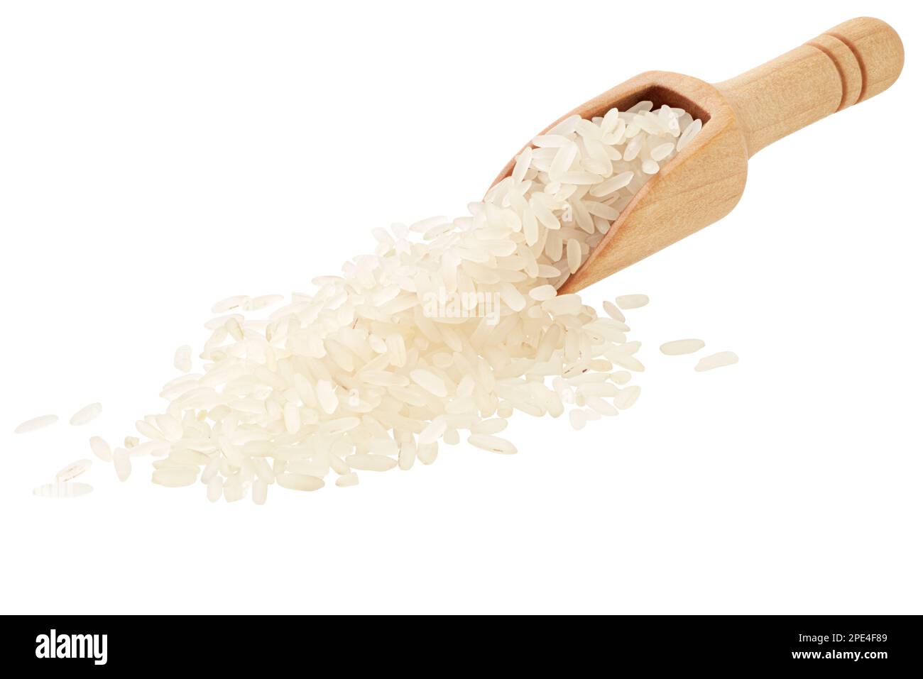 Pile of uncooked white rice in a wooden spoon, isolated on white ...