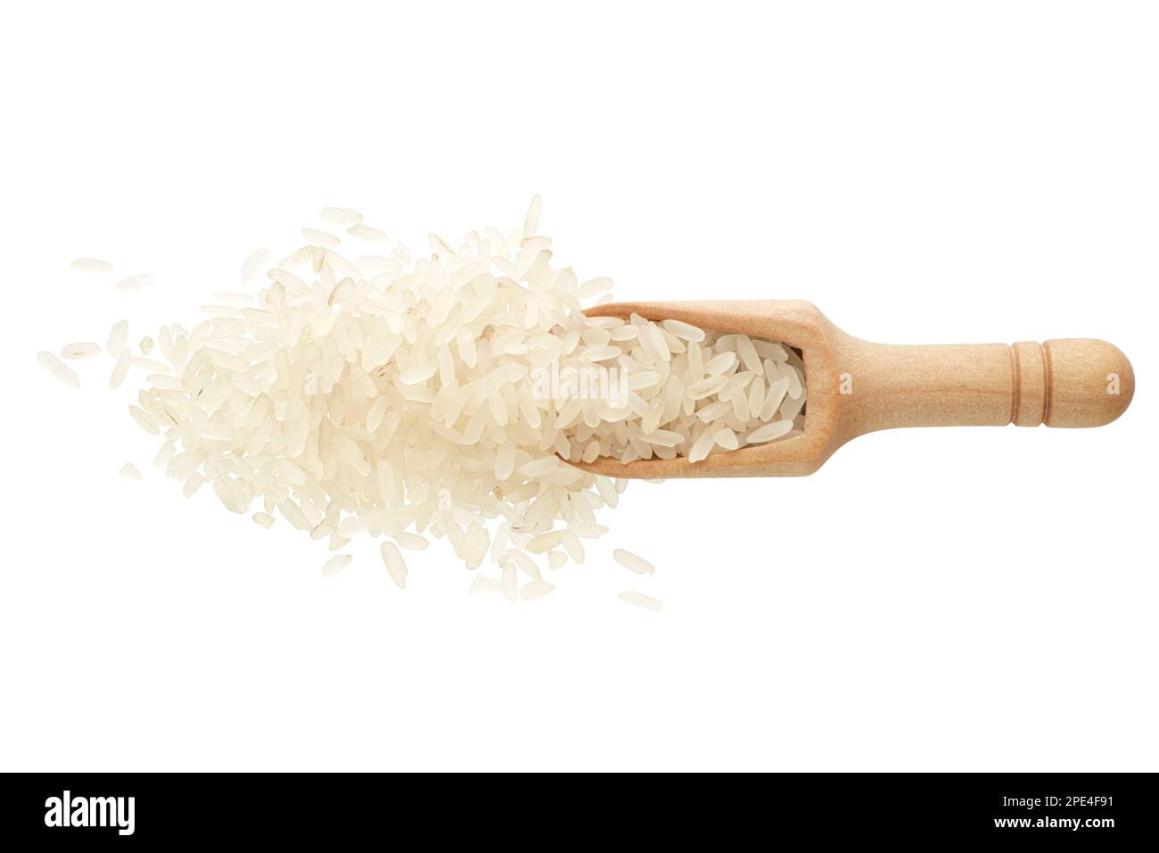 Pile of uncooked white rice in a wooden spoon, isolated on white ...