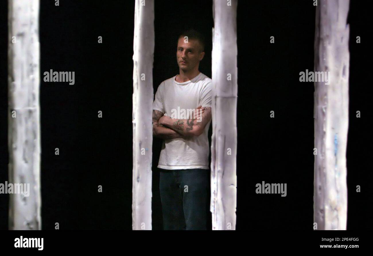 Banks Violette stands next to a section of his art installation ...