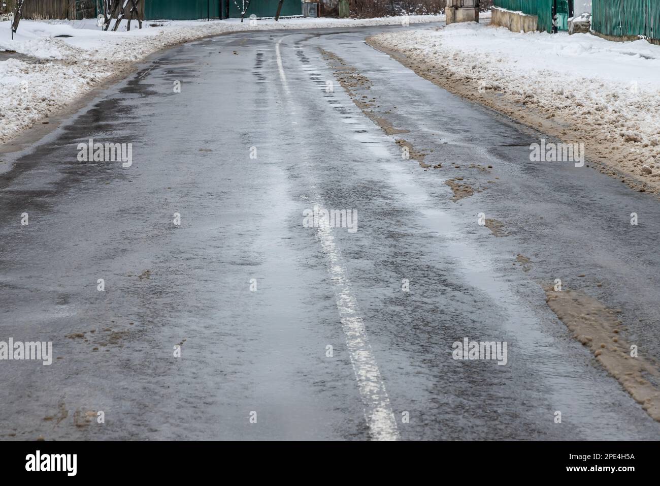 Winter road outside the city, cleared of snow in the countryside. Large ...