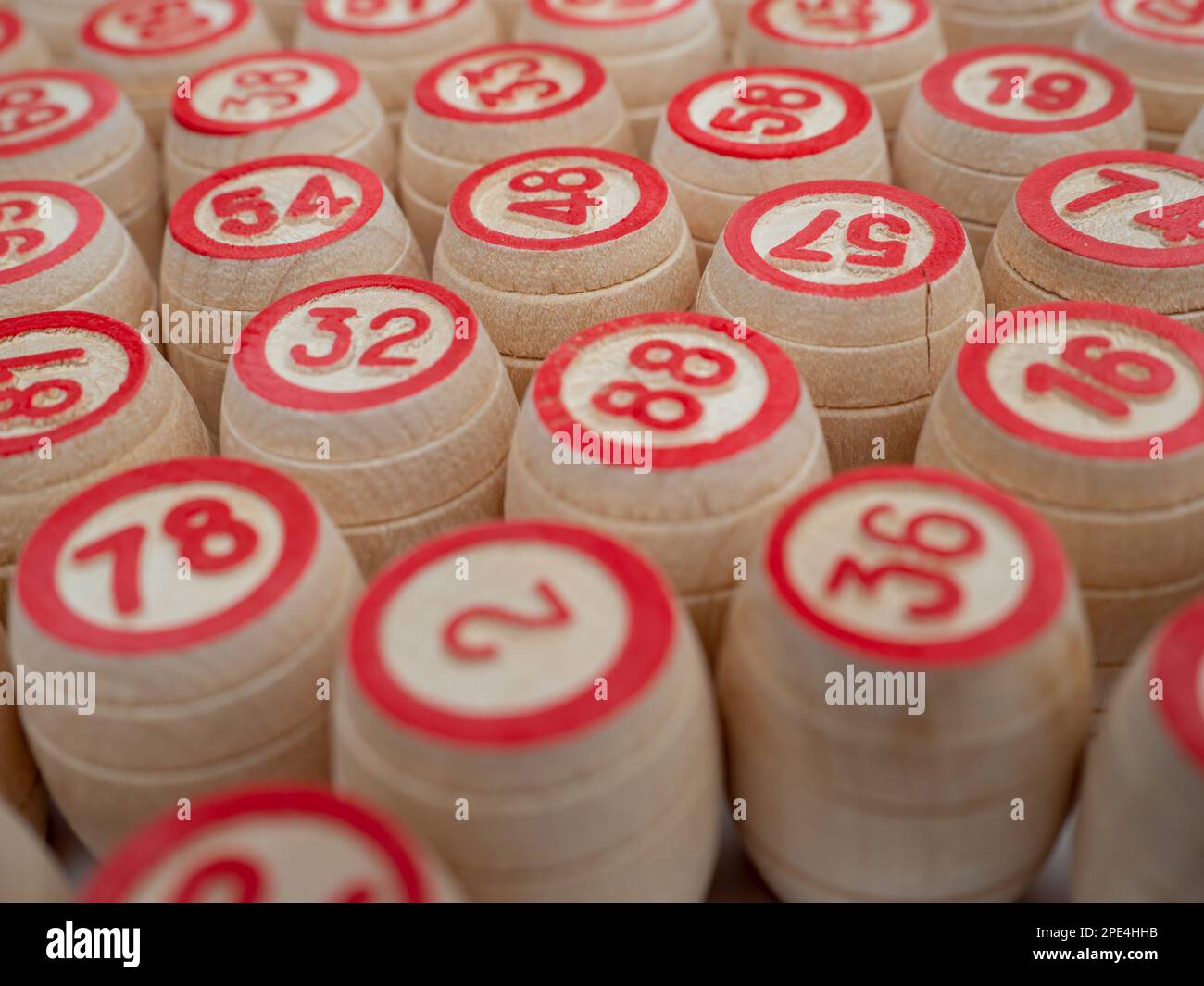 Board game bingo. Wooden barrels with lotto numbers, playing cards for ...