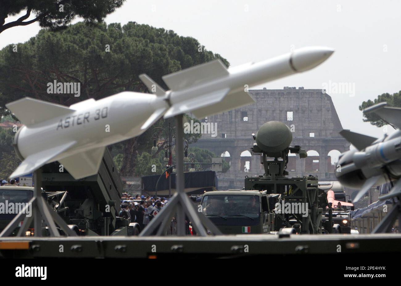 With the ancient Colosseum in the background, Italian weapons and ...