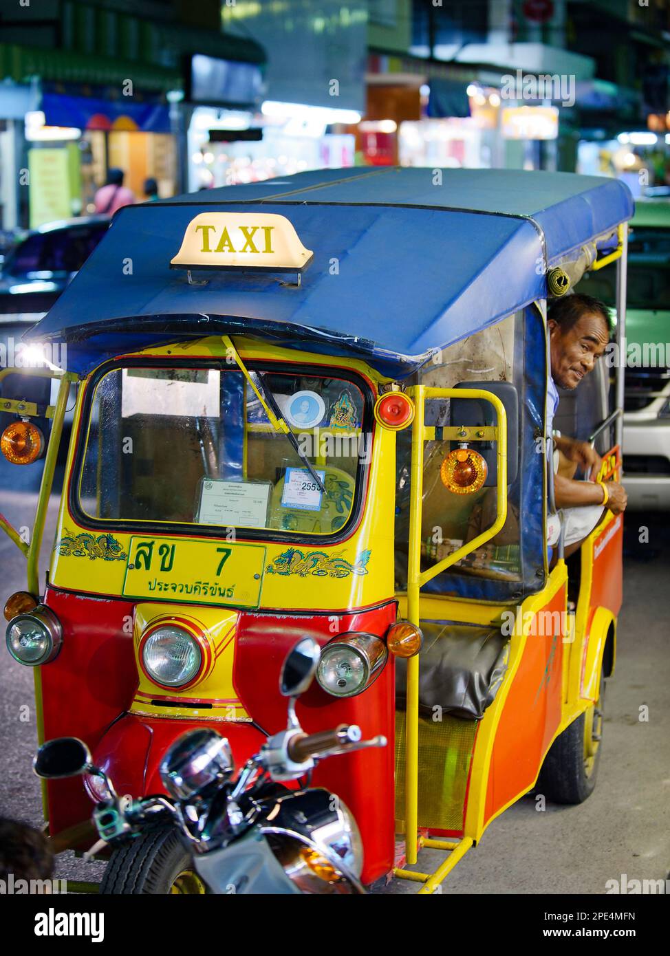 Man in back of Tuk-Tuk in Thailand Stock Photo - Alamy