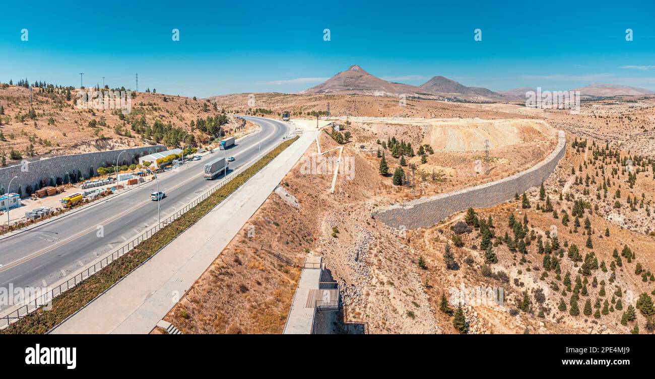 Aerial view of a scenic serpentine road at the dangerous and majestic ...