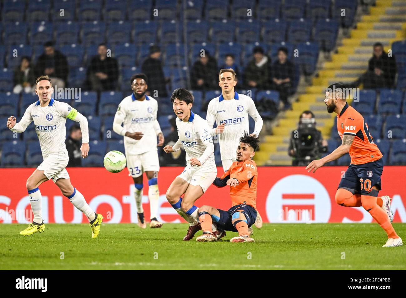 Gent's Hyunseok Hong and Basaksehir's Serdar Gurler pictured in action ...