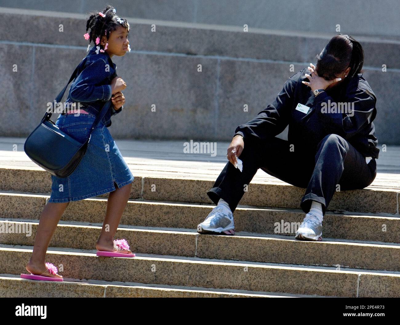 Lisa Doss grieves outside Cleveland's Public Auditorium after she and ...