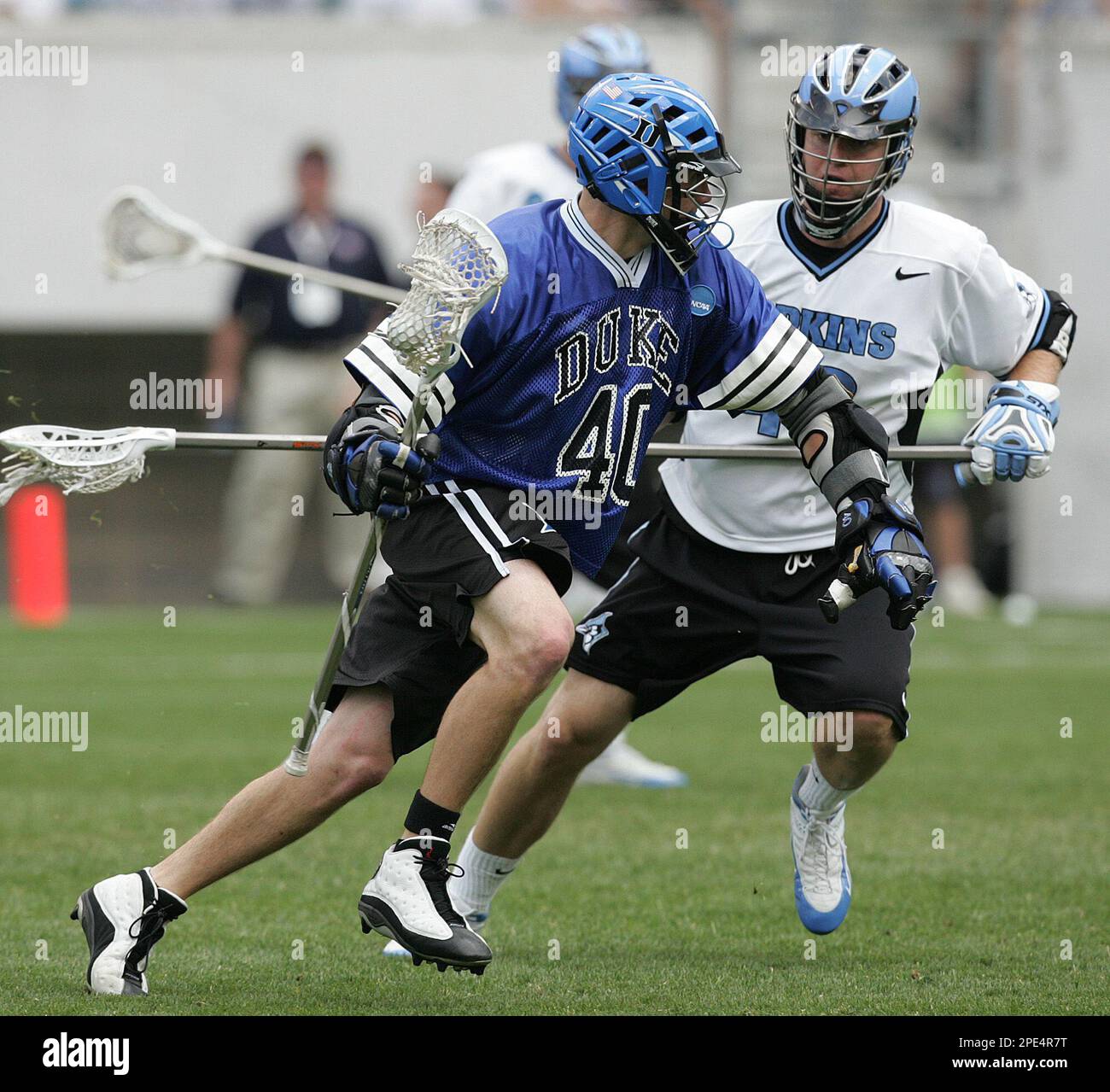 Johns Hopkins' Chris Watson, right, defends against Duke's Matt ...