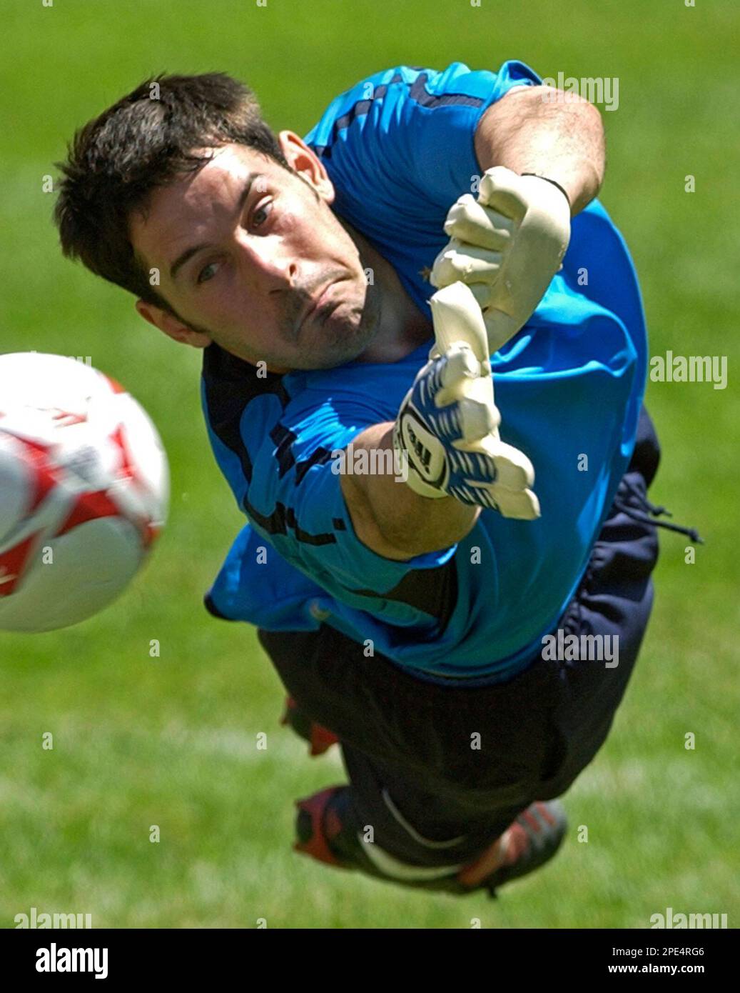 England's goalkeeper Scott Carson makes a save during practice Monday ...