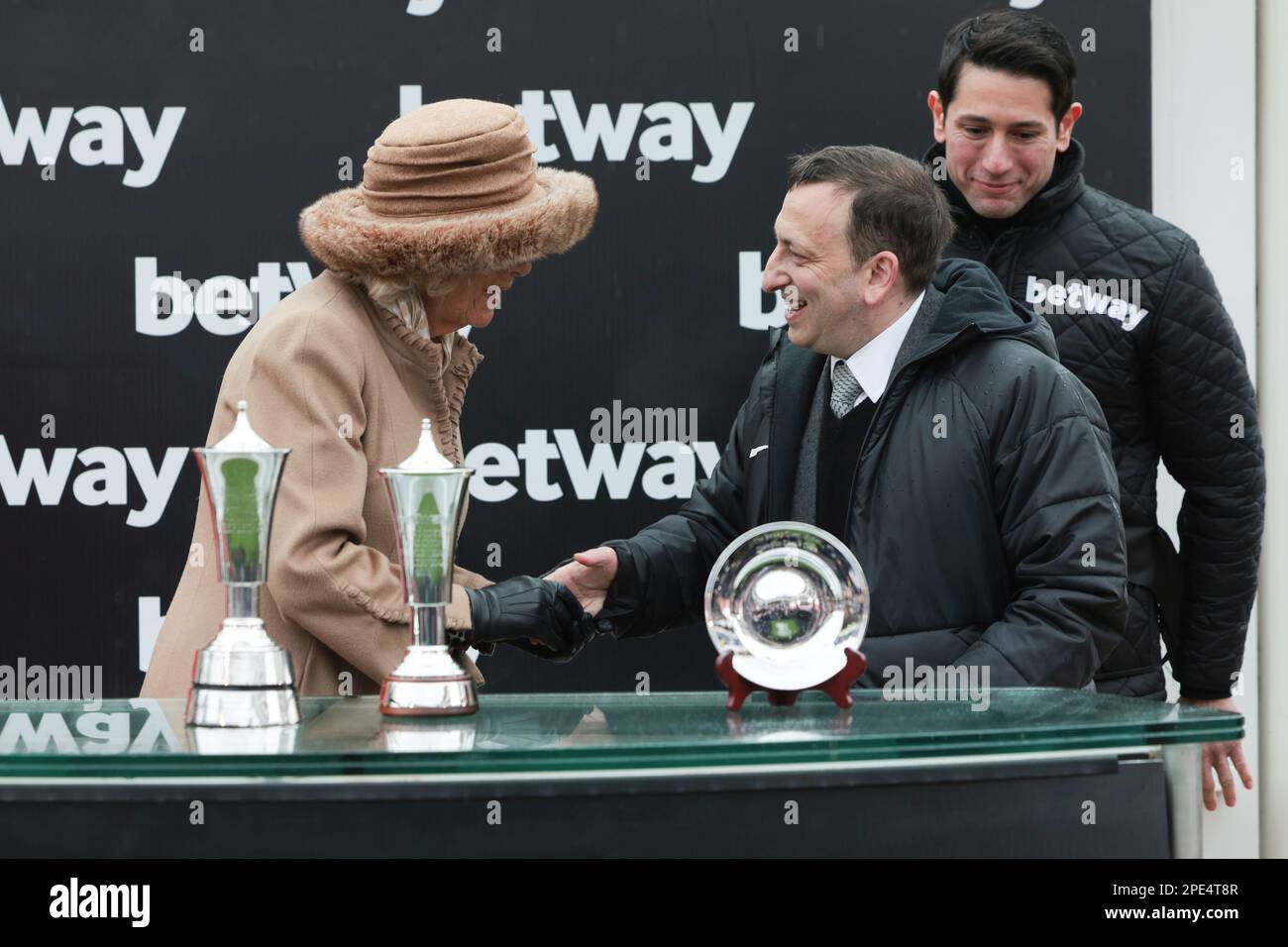 The Queen Consort presents owner Tony Bloom with his trophy after ...