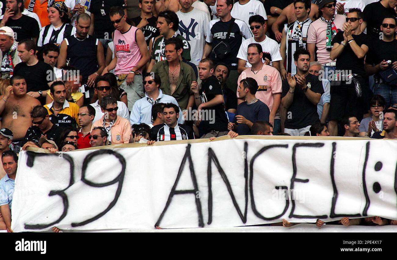 Juventus supporters display a banner reading "39 angeli" (39 angels) to ...
