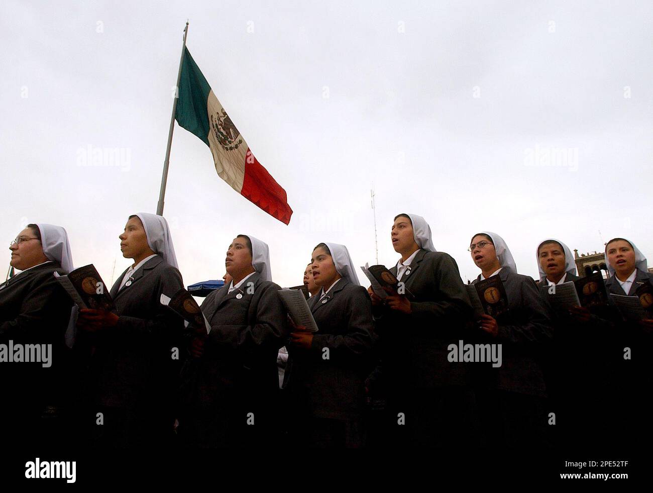Nuns pray during Corpus Christi celebrations at the Zocalo Square ...