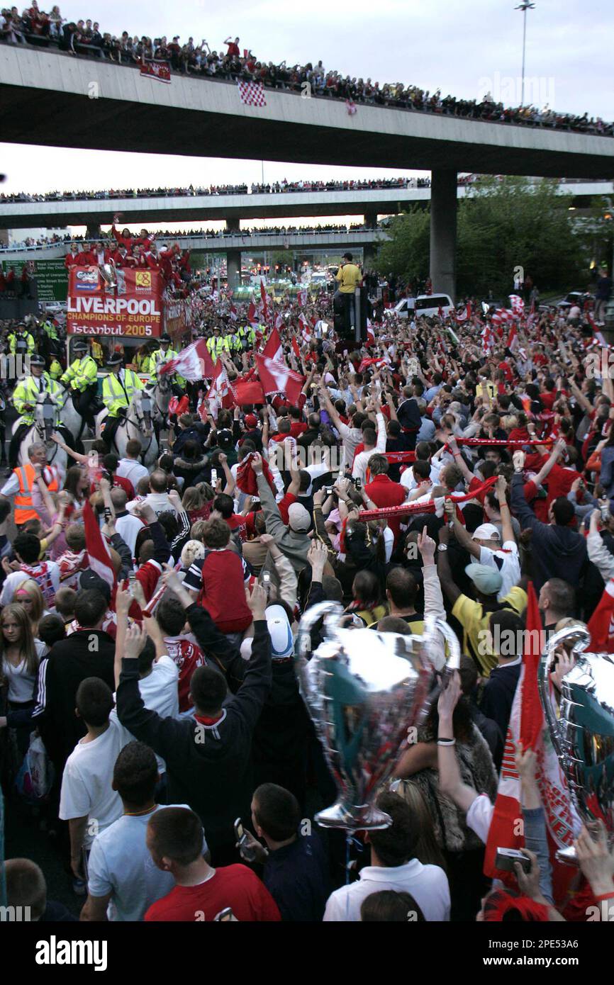 Liverpool football team celebrate with exultant fans as their open top ...