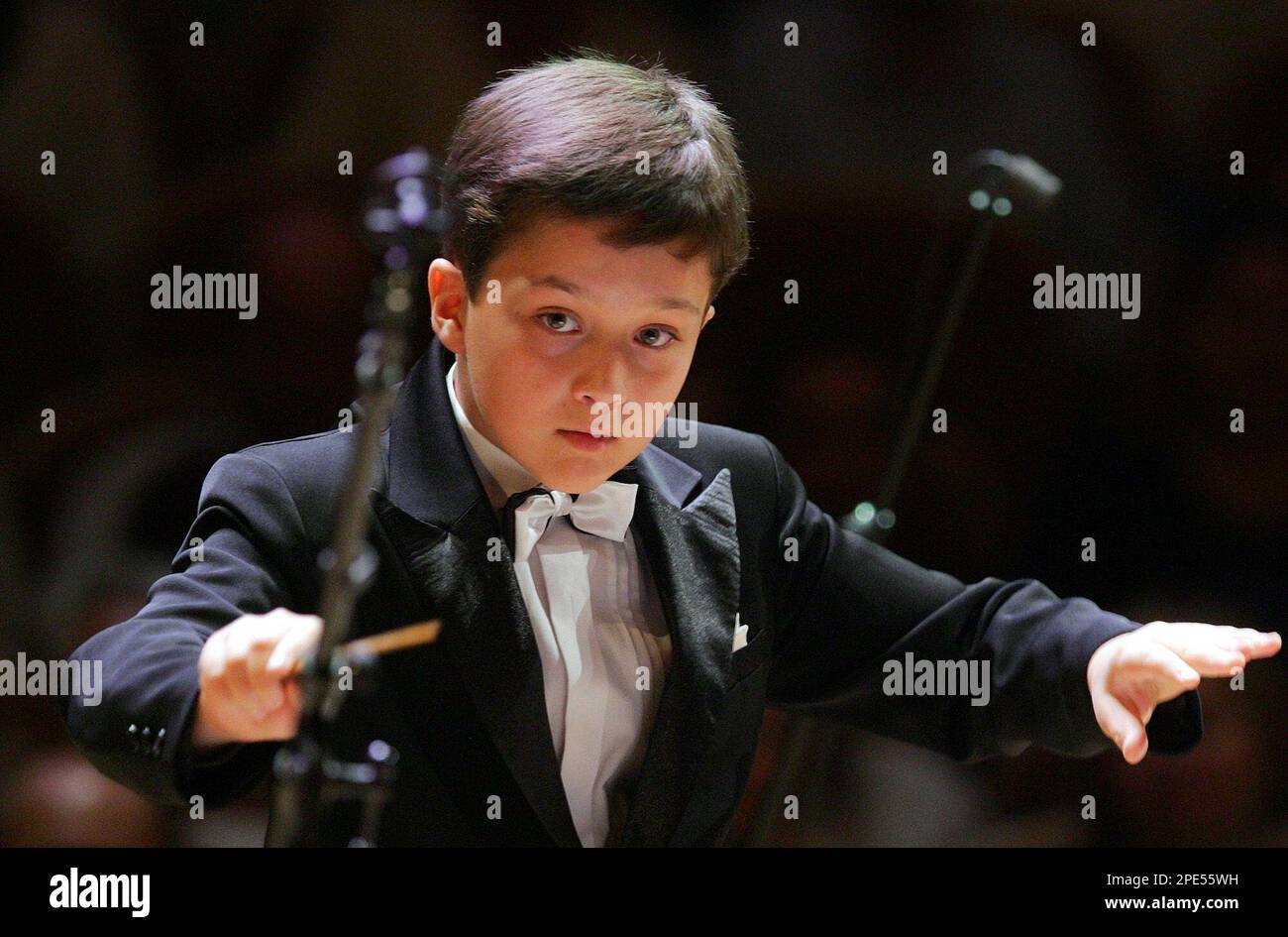 Timur Zangiev, 11-year-old boy, conducts the orchestra founded by ...