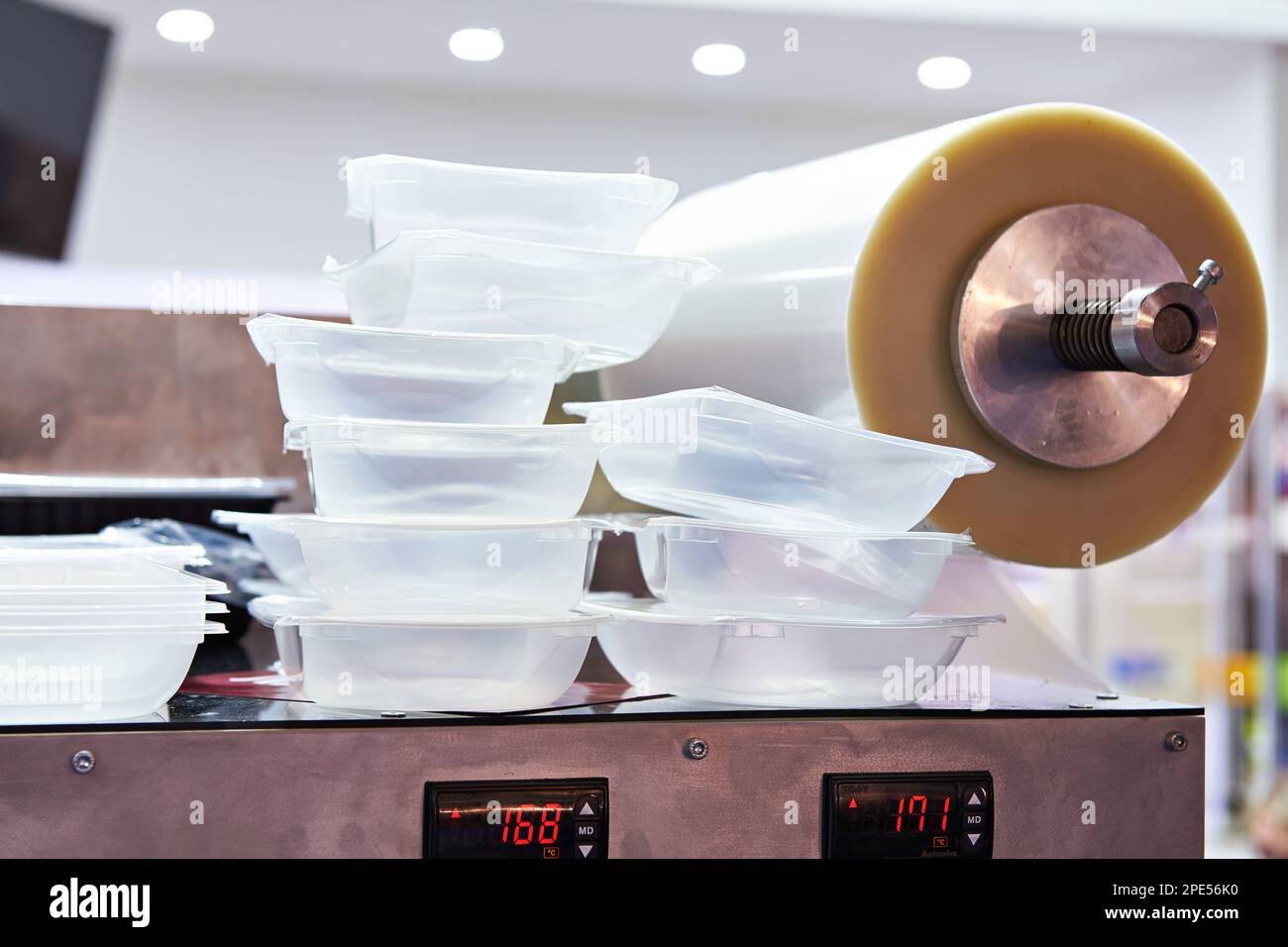 Industrial equipment for food packaging in factory Stock Photo - Alamy
