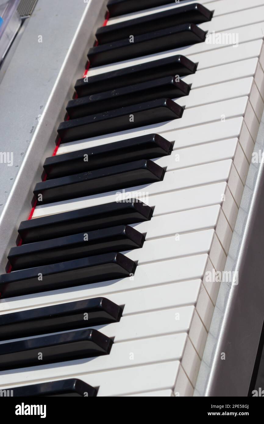 close-up of piano keys. close frontal view, black and white piano keys ...