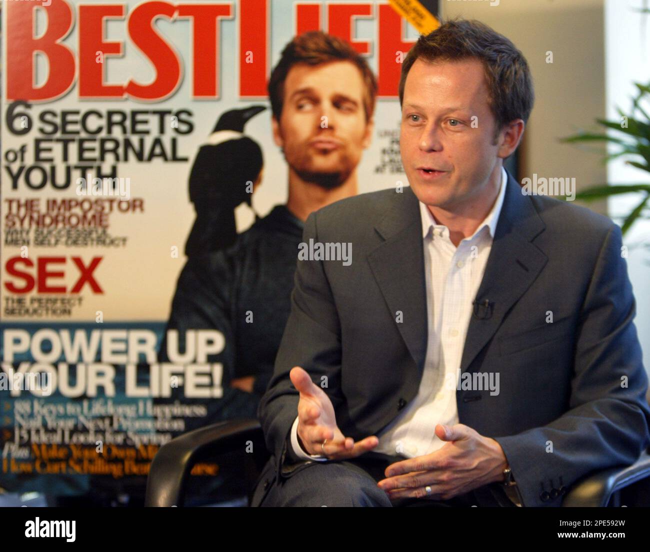 Stephen Perrine, editor-in-chief of BestLife magazine gestures during ...