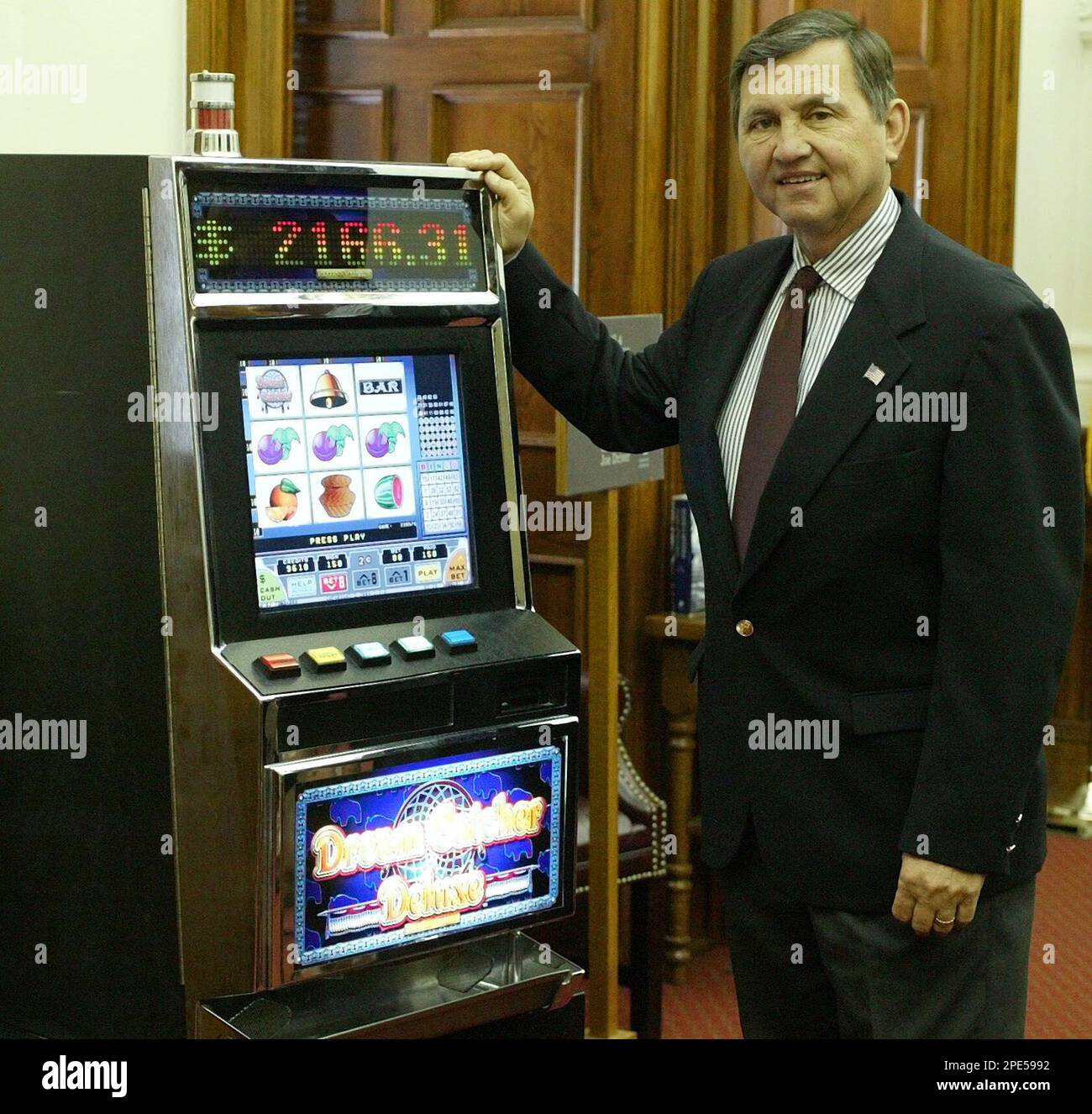 Rep. Charlie Howard, R-Sugar Land, is shown with a bingo lottery ...