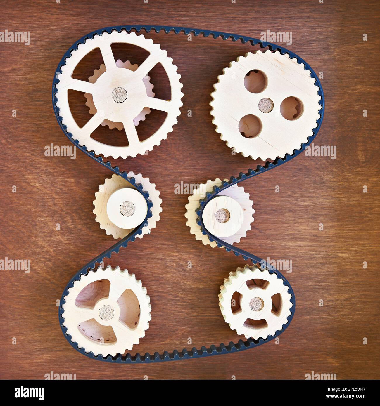 Wooden gear mechanism abstract background Stock Photo - Alamy