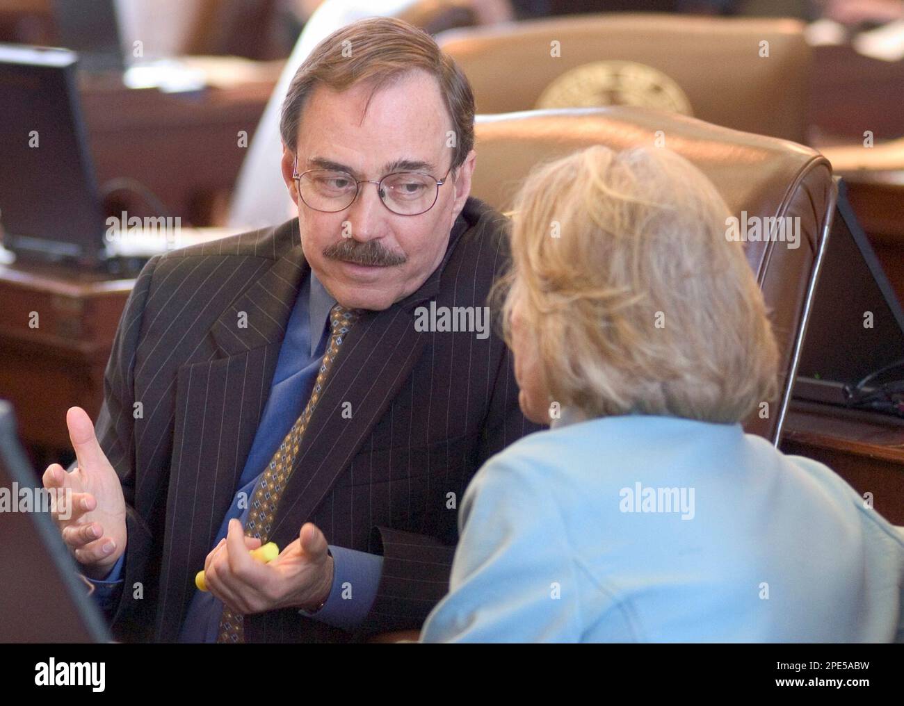 Rep. Kent Grusendorf, R-Arlington, left, speaks with Rep. Dianne Delisi ...