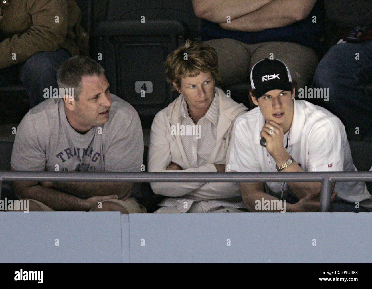 Troy and Trina Crosby, from left, speak with their son, Rimouski ...