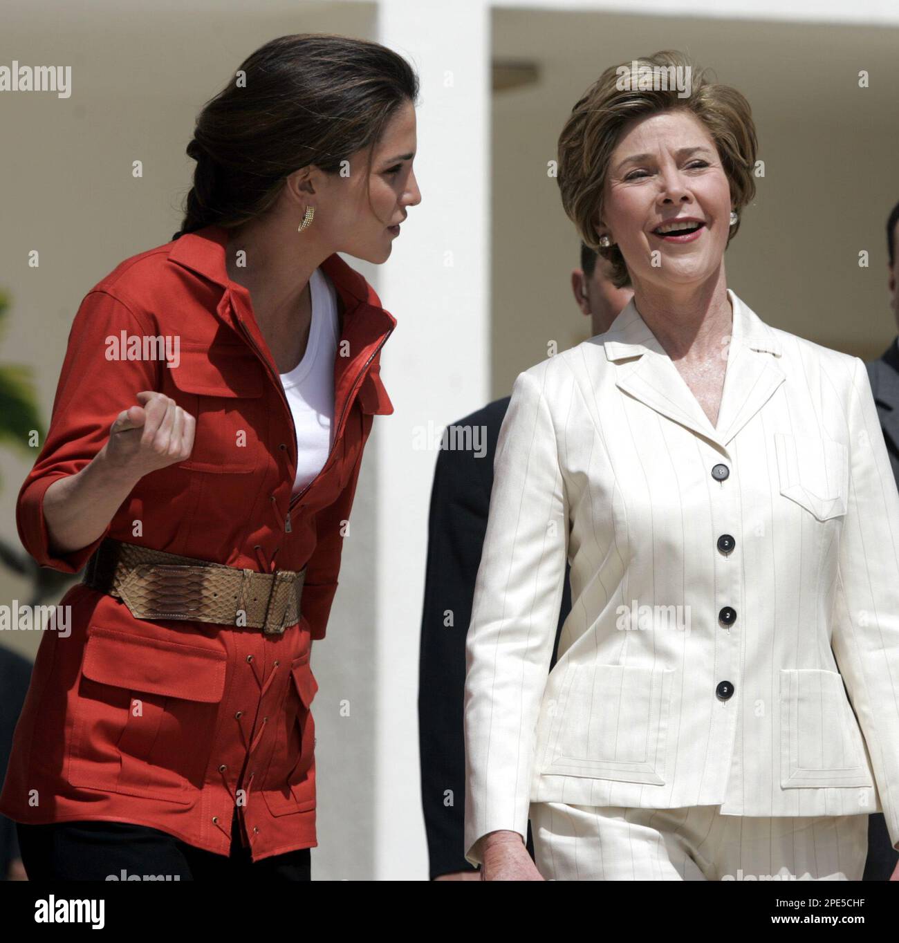 U.S. first lady Laura Bush, right, walks with Jordanian Queen Rania al ...
