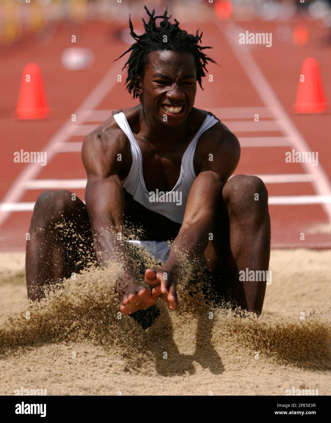 Palmer's Raymond Blackledge hits the sand, jumping 48 feet 5 1/4 inches ...