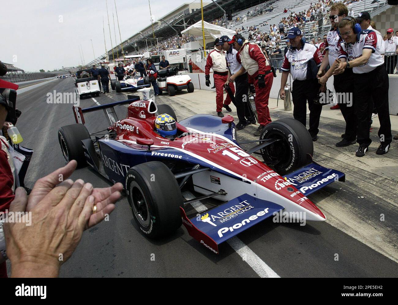 Indy Racing League driver Kenny Brack of Sweden returns to the pit area ...