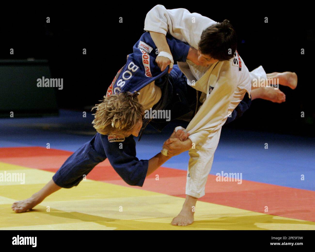 Dutch Edith Bosch, left, on her way to defeat Italy's Ylenia Scapin in ...