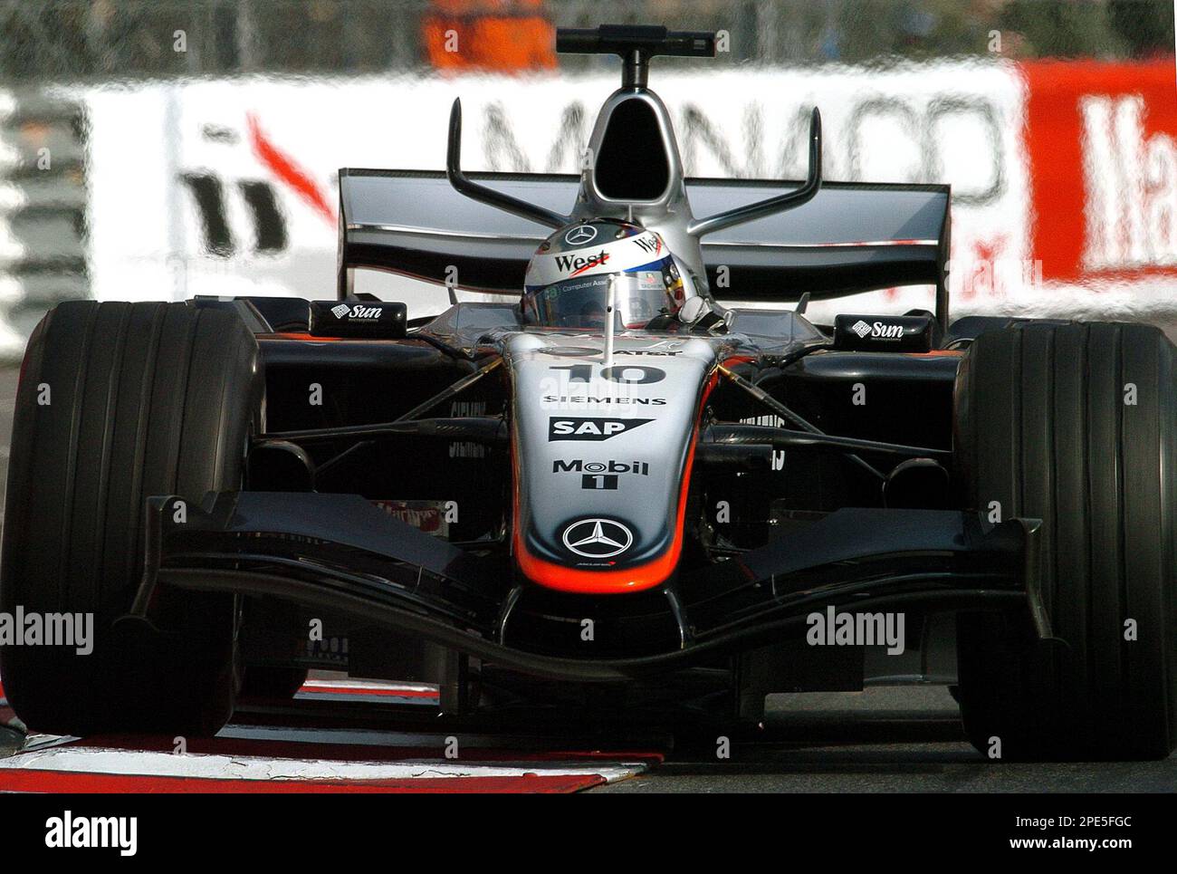 Colombian driver Juan Pablo Montoya steers his Mc Laren Mercedes during ...