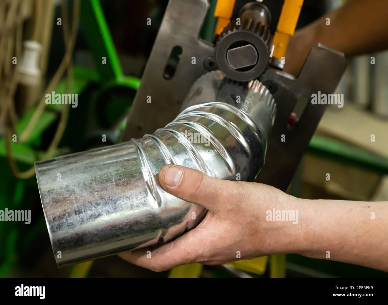 the machine for production of products from a plate during work Stock ...